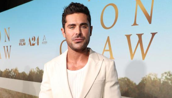 Zac Efron hits carpet in Mark Chris